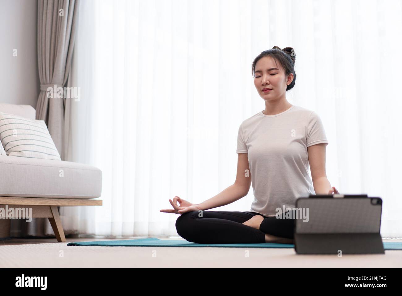 Productive activity concept a calm girl concentrating on meditating ...