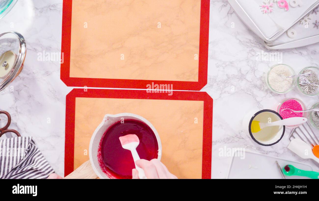 Flat lay. Step by step. Pouring caramelized sugar on a silicone baking ...