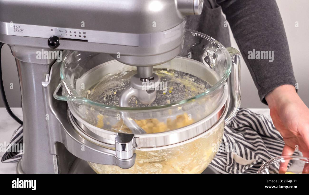 Step by step. Mixing ingredients in kitchen mixer to bake homemade ...