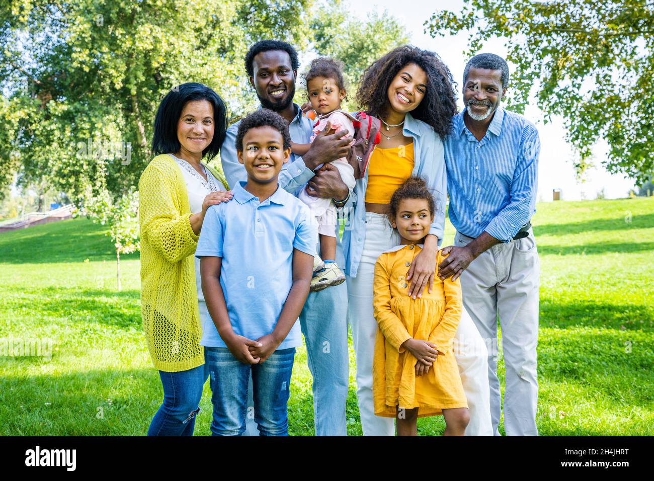 Beautiful happy african american family bonding at the park - Black ...