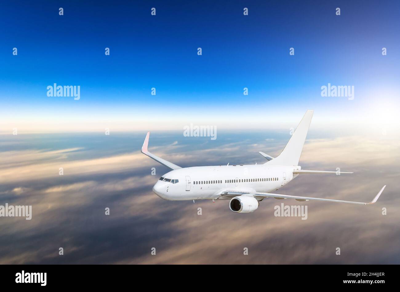 Airplane in the sky above the clouds flight journey sunset height Stock ...