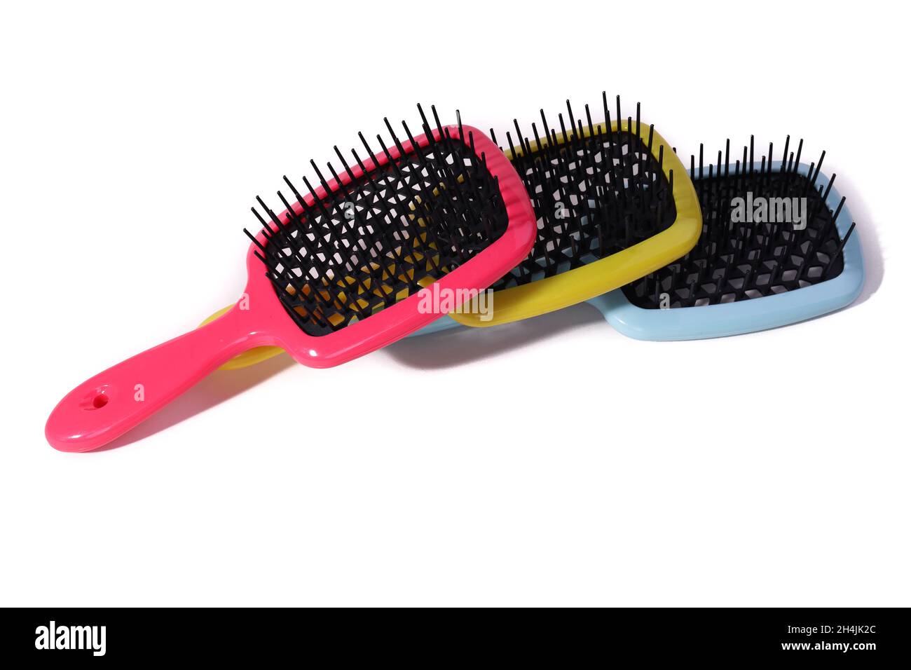 Multi-colored hair combs on an isolated white background Stock Photo ...