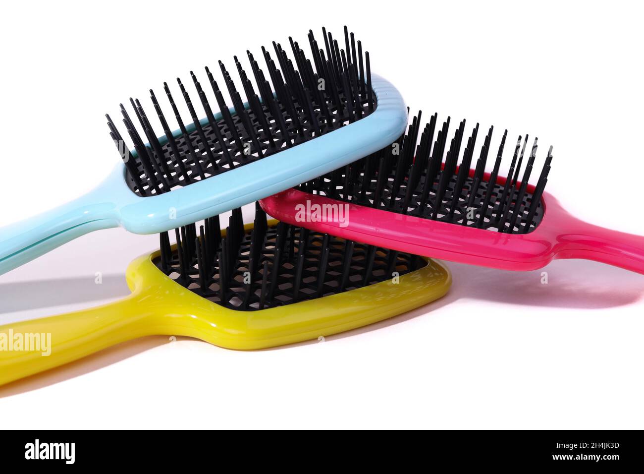 Multi-colored hair combs on an isolated white background Stock Photo ...