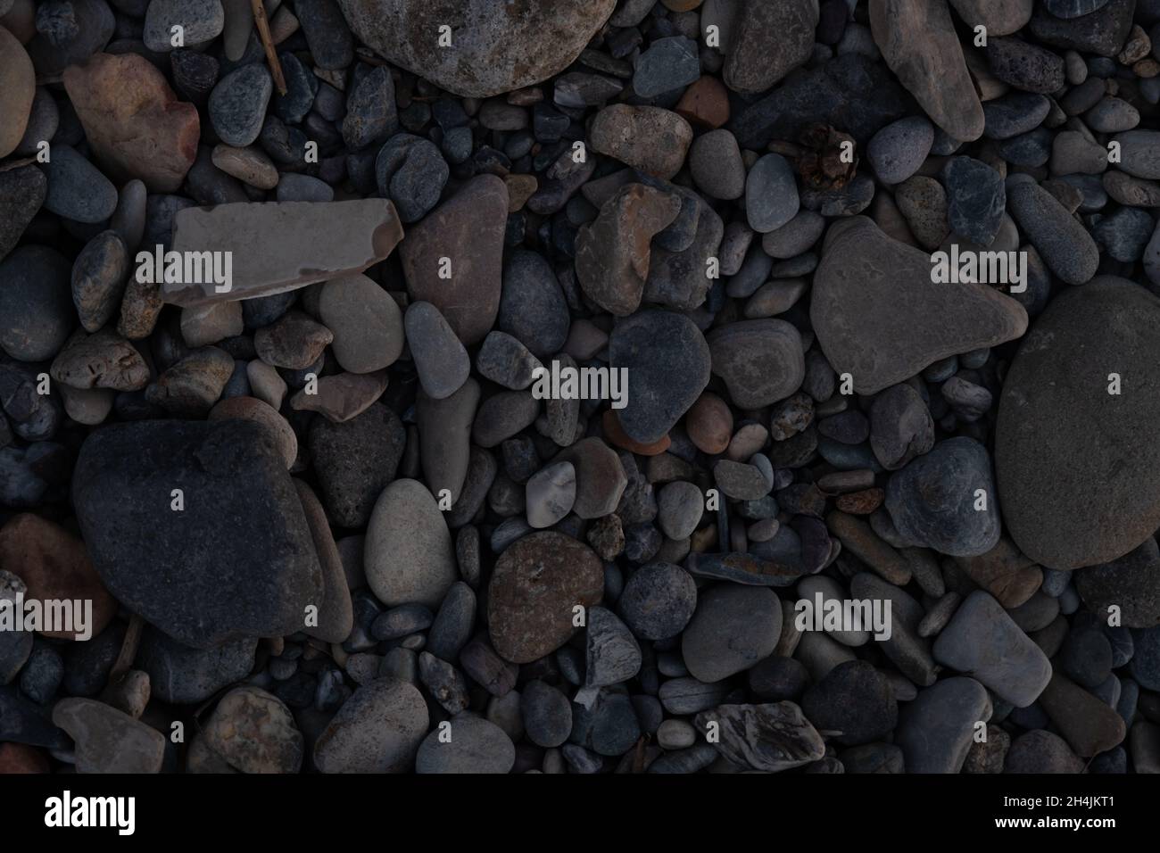 top view photo of pebbles and stones on the beach Stock Photo - Alamy