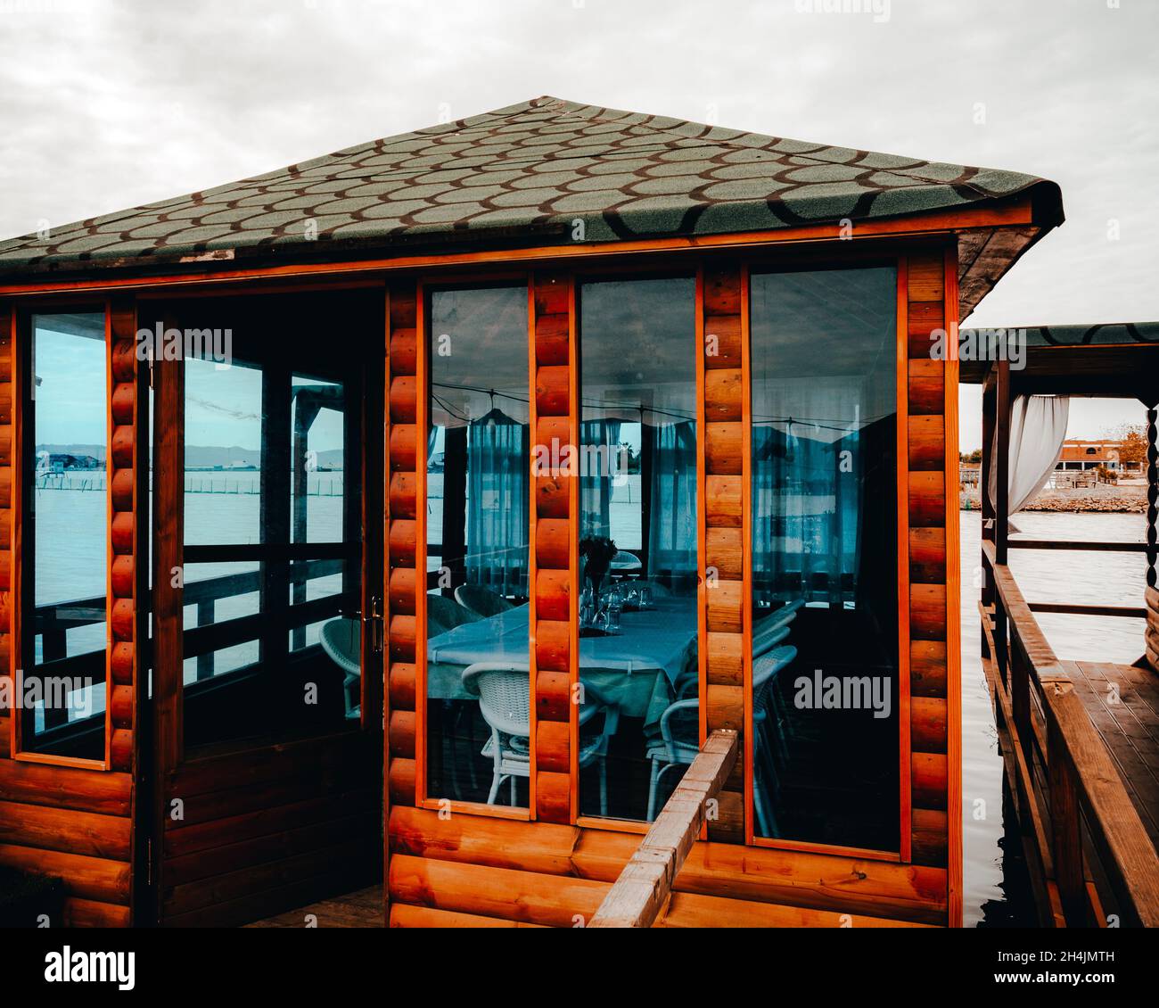 Beautiful restaurant rooms in the water Stock Photo - Alamy