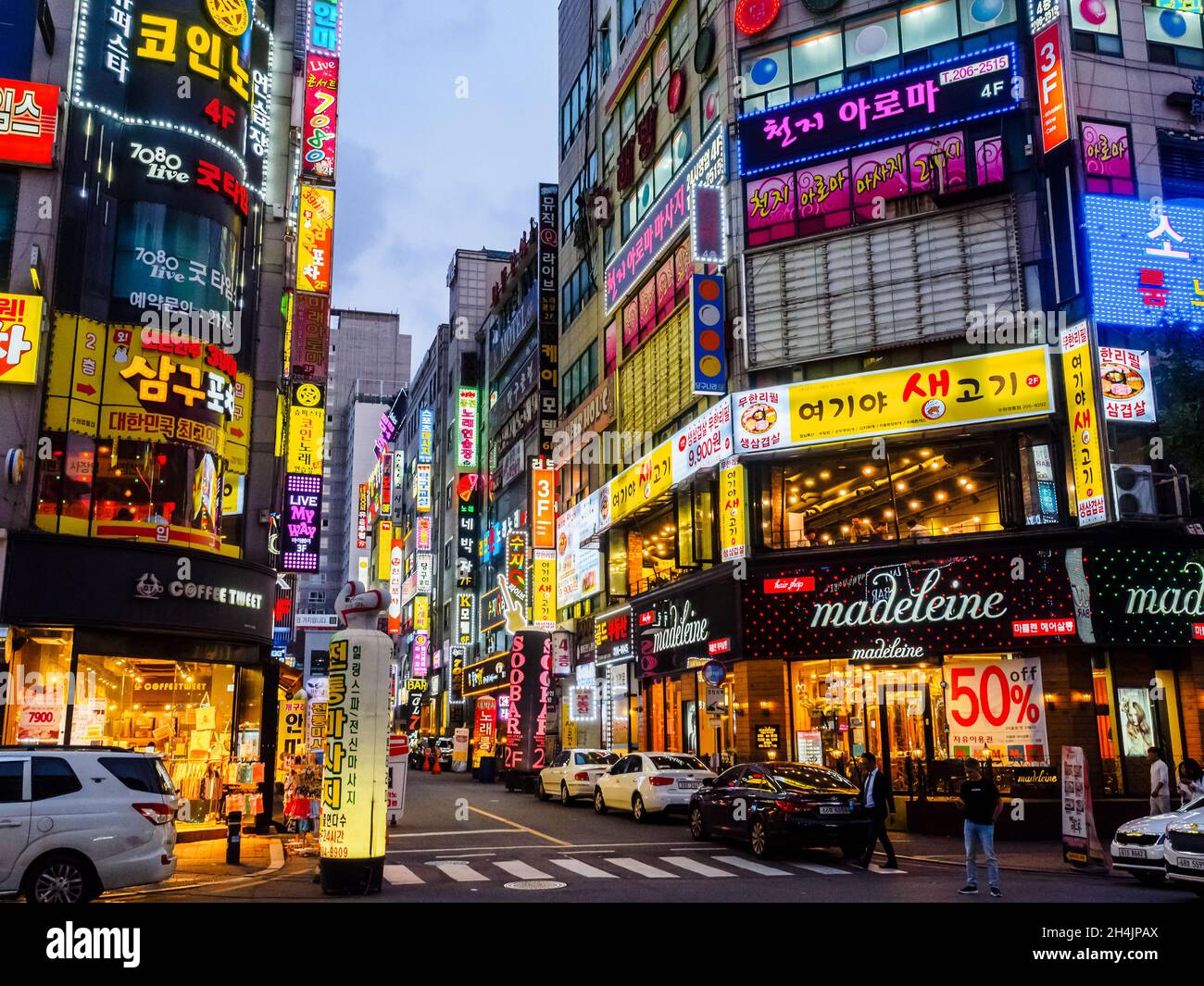 Seoul, South Korea - June 13, 2017: People walking down a street in ...