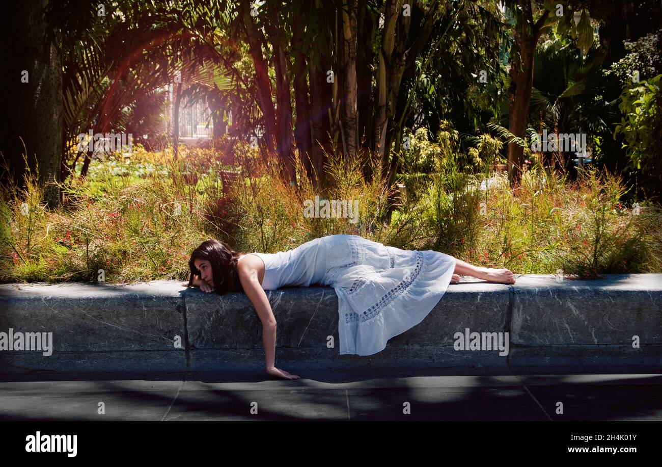 Woman lying down dress hi-res stock photography and images - Alamy