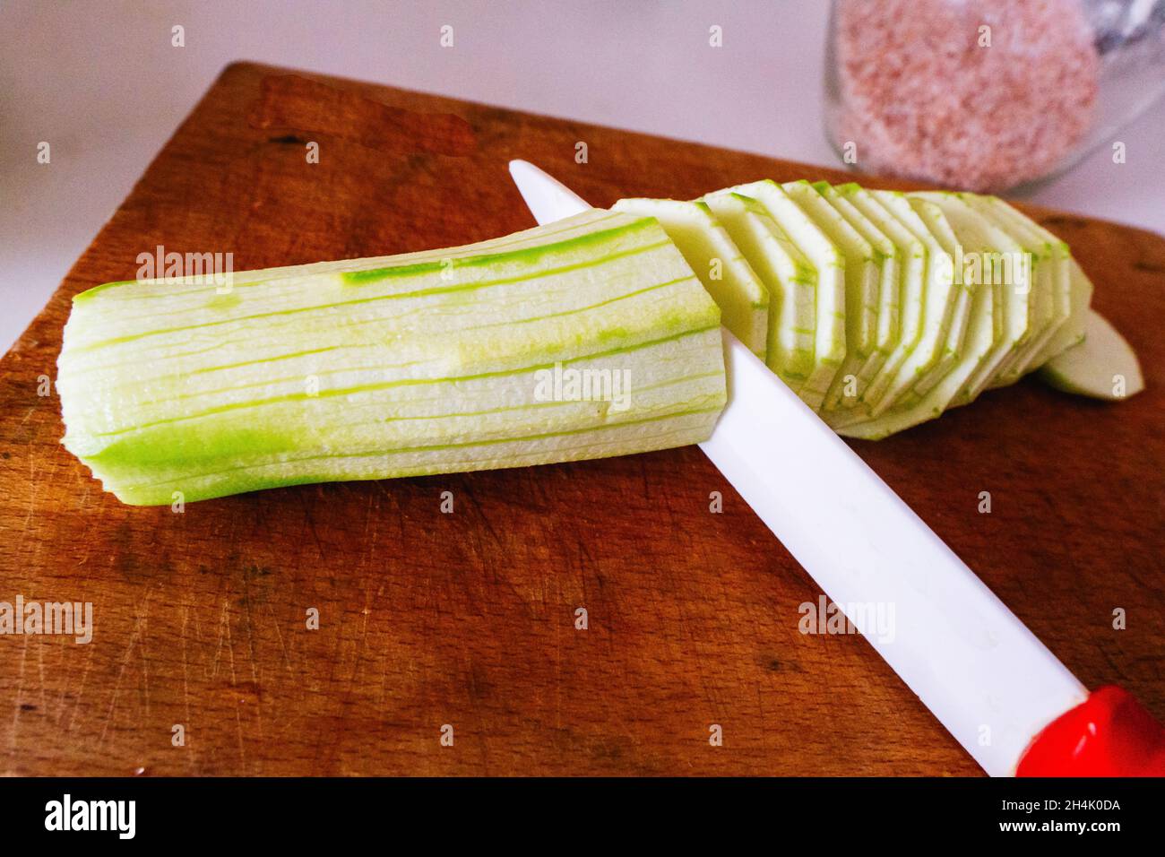 Cucumber on chopping board hi-res stock photography and images - Alamy