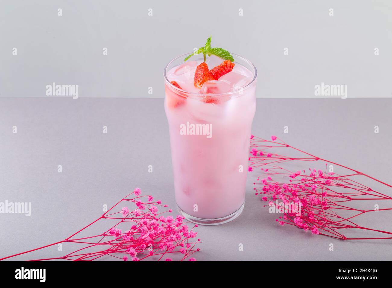 Strawberry lemonade with rose water flowers Stock Photo - Alamy