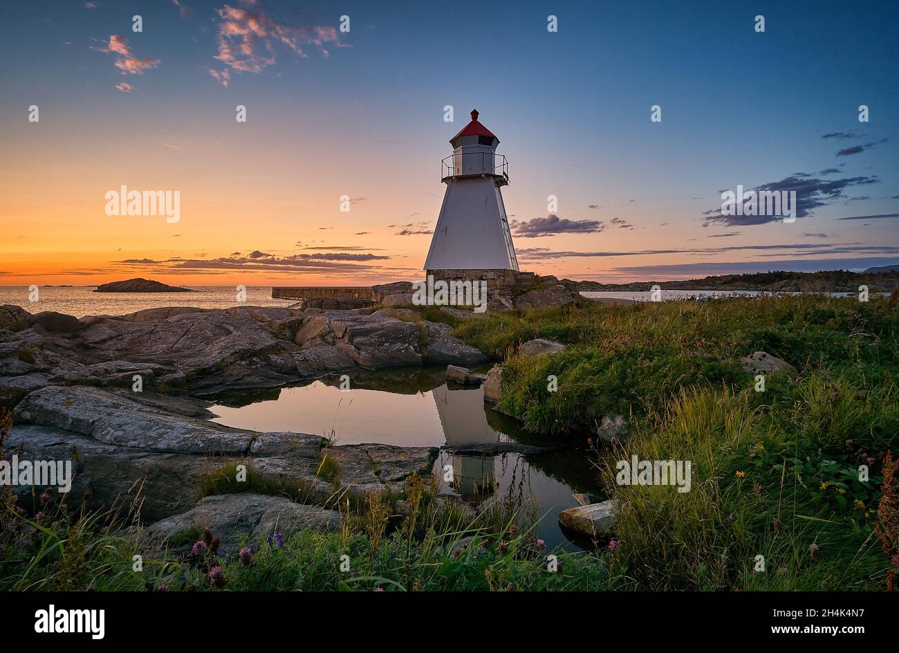 Glorious sunset with lighthouse, Vigra, Norway Stock Photo - Alamy