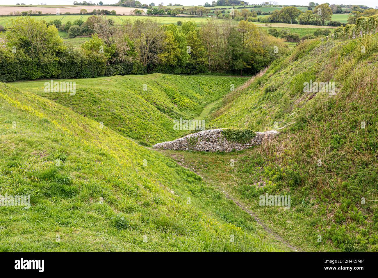 Part of the defensive ditch and earthworks around the medieval castle ...