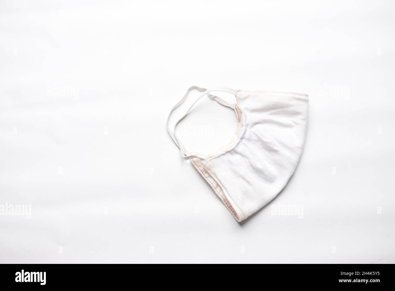 white cloth mask, photo from the side of the mask Stock Photo - Alamy