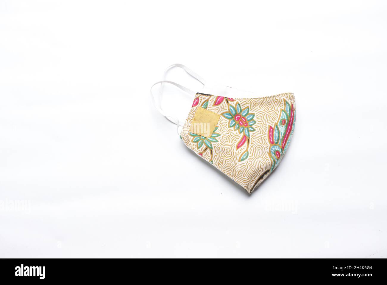 cloth mask with batik texture, photo seen from the left side of the ...