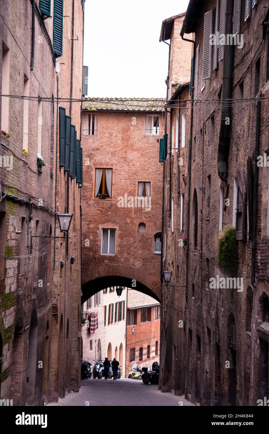 Romanesque arched brick building Siena, Italy Stock Photo - Alamy