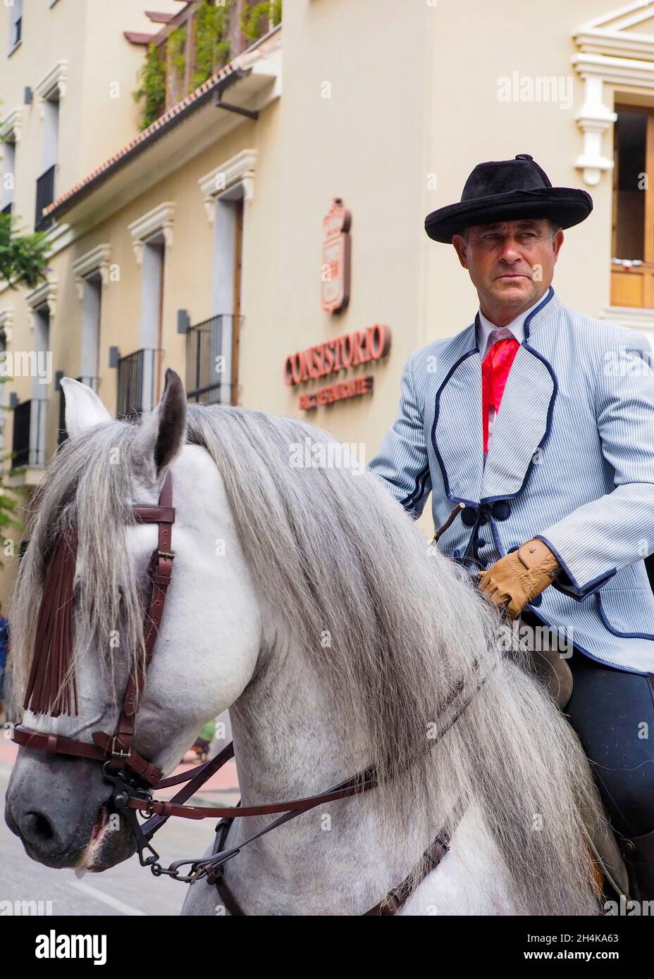 Man on horseback dressed in typical Andalusian costume Stock Photo - Alamy