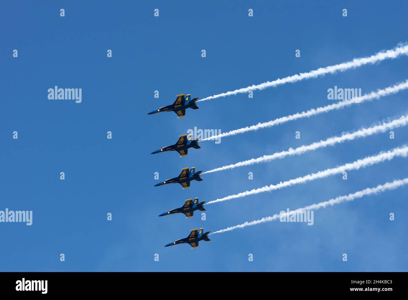 Group of flying aircraft against a blue sky during an airshow Stock ...