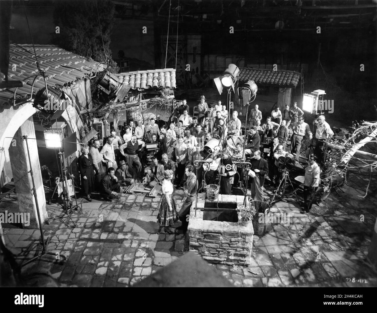 NANCY OLSON and WILLIAM HOLDEN on set candid with Director MICHAEL ...