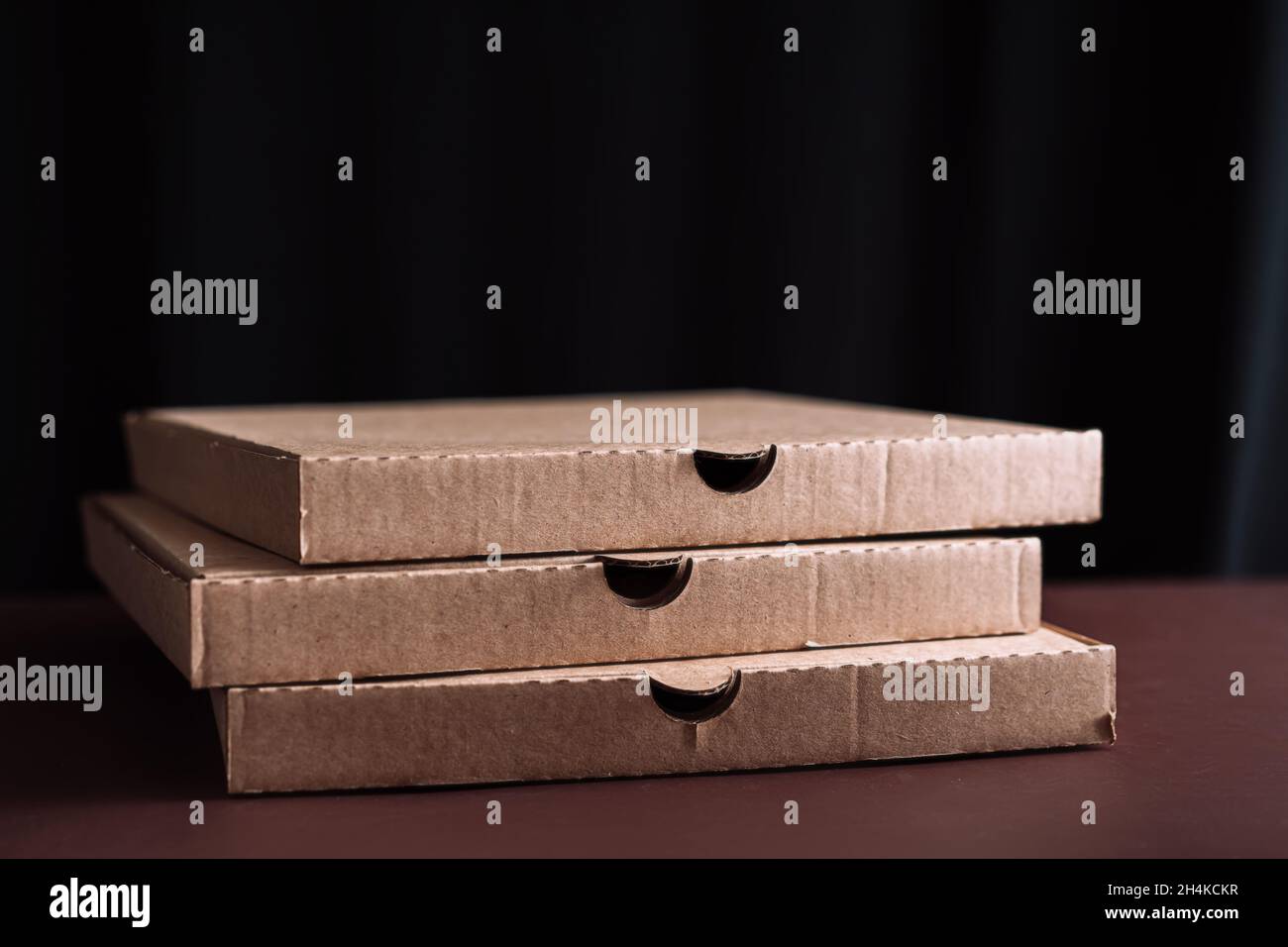Three pizza boxes stacked on top of each other Stock Photo - Alamy