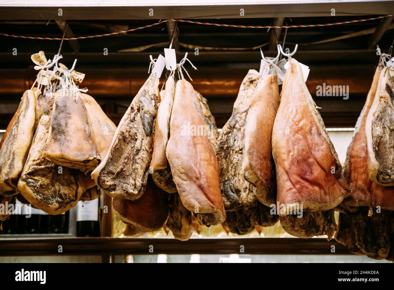 Dried ham hanging hi-res stock photography and images - Alamy