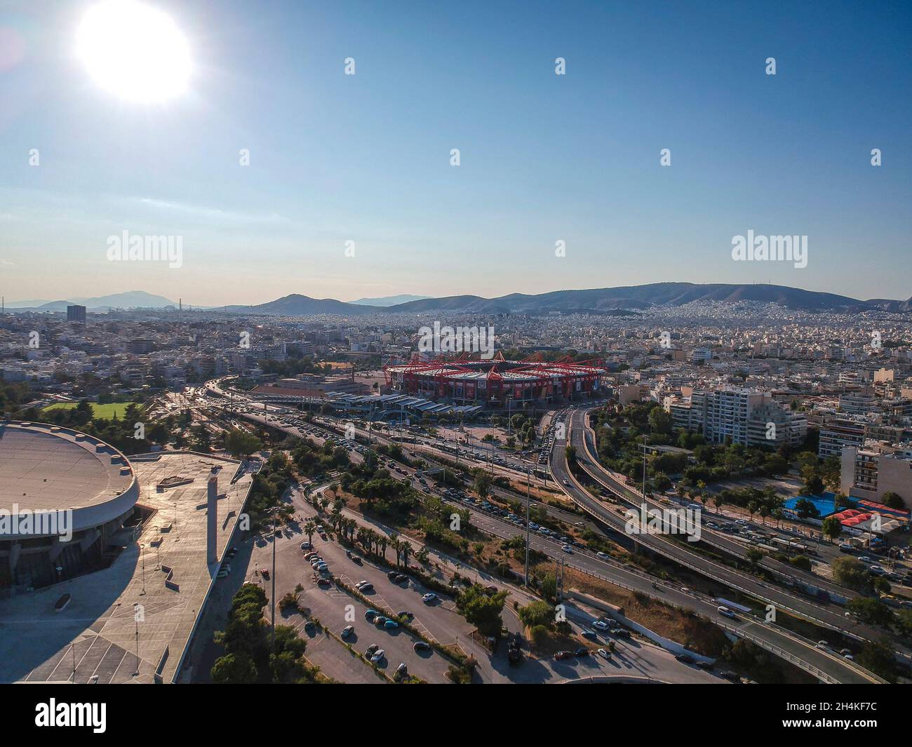 Vehicles elevating one of the most complex roads in Athens, the famous ...