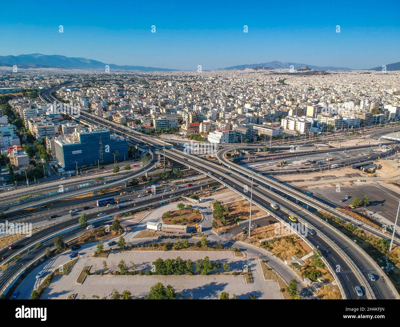 Vehicles elevating one of the most complex roads in Athens, the famous ...