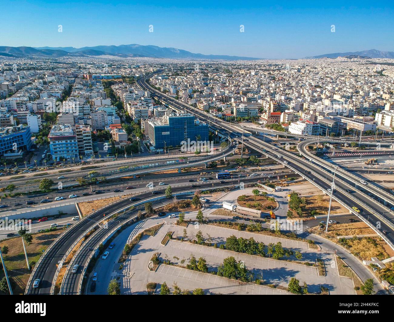 Vehicles elevating one of the most complex roads in Athens, the famous ...