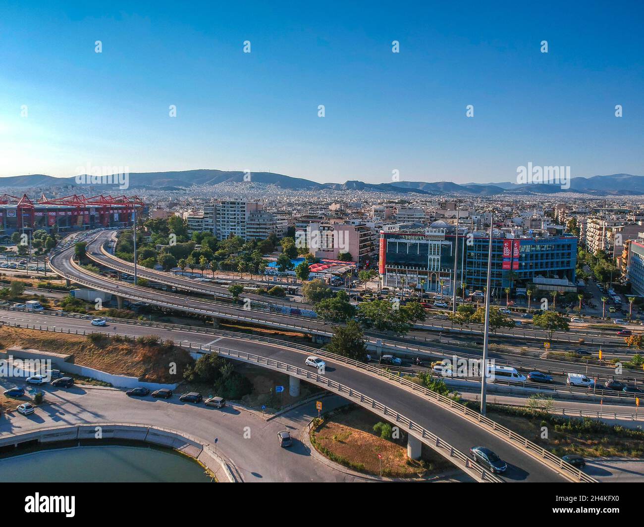 Vehicles elevating one of the most complex roads in Athens, the famous ...