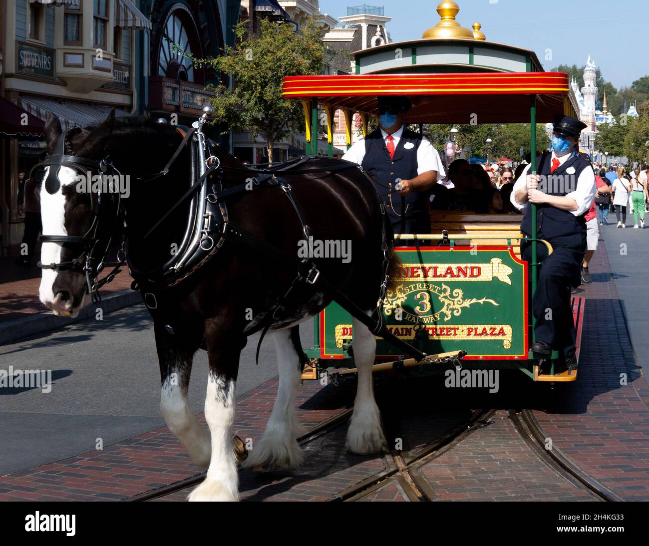 A horse pulls the trolley down Main Street of Disneyland, Anaheim ...