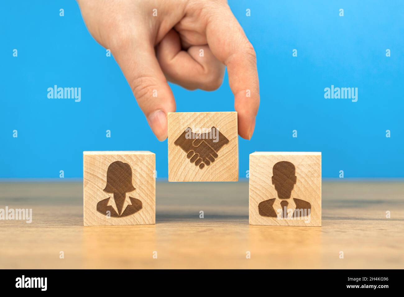 Concept of team and cooperation. Female and male person hand shaking ...