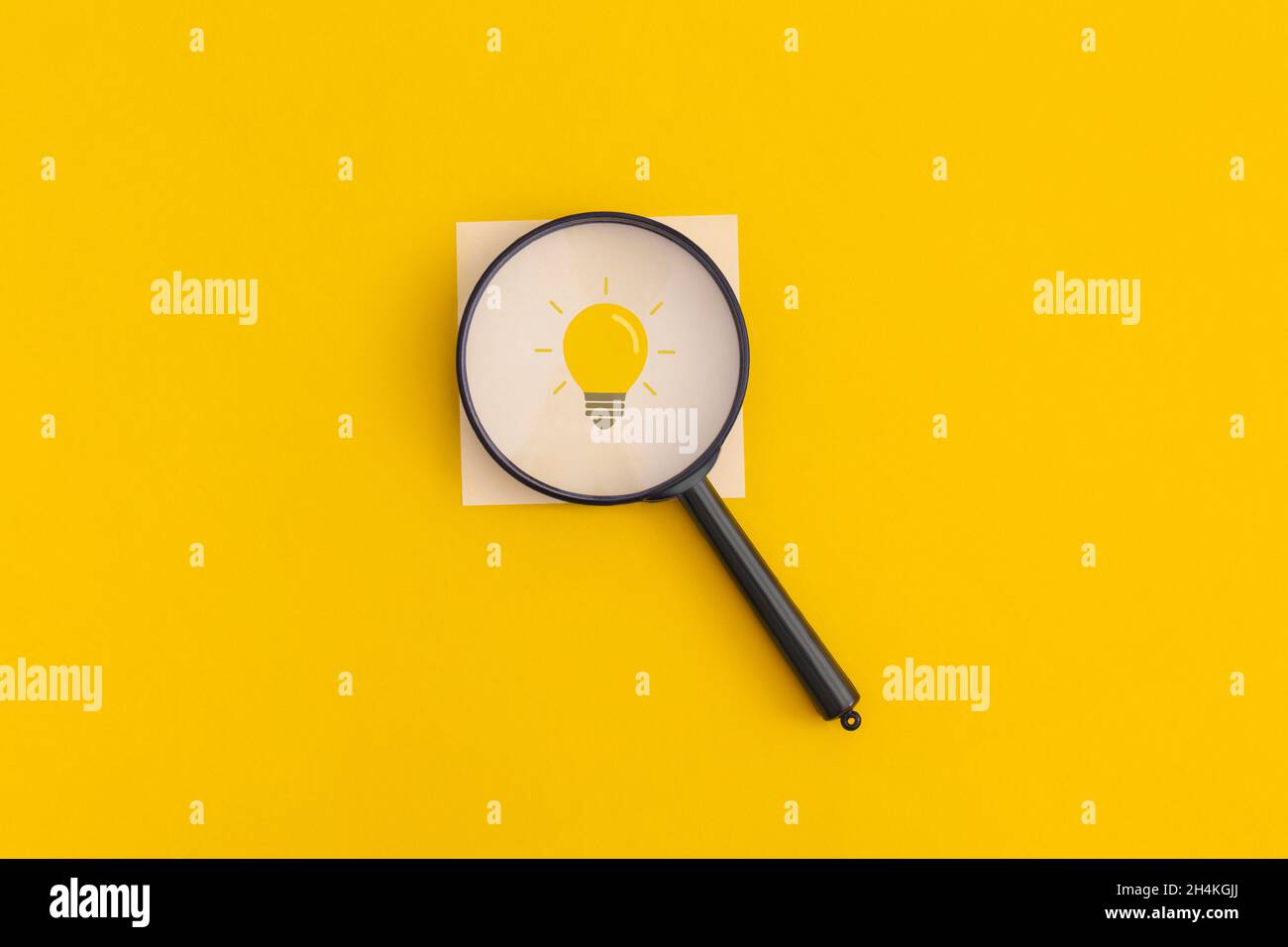 Light bulb on yellow background. Inspiration and creative idea concept ...
