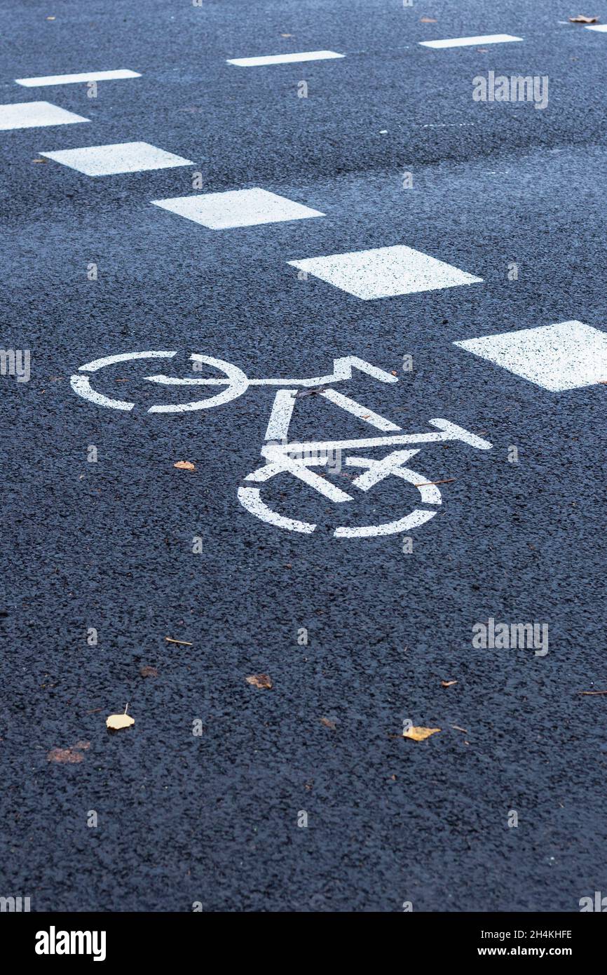 Bicycle path passing through the pedestrian crossing Stock Photo - Alamy