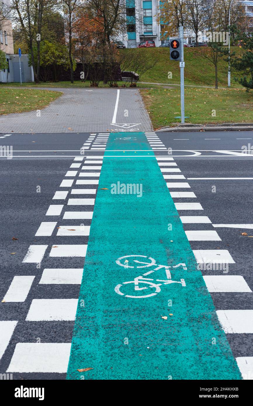 Bicycle path passing through the pedestrian crossing Stock Photo - Alamy