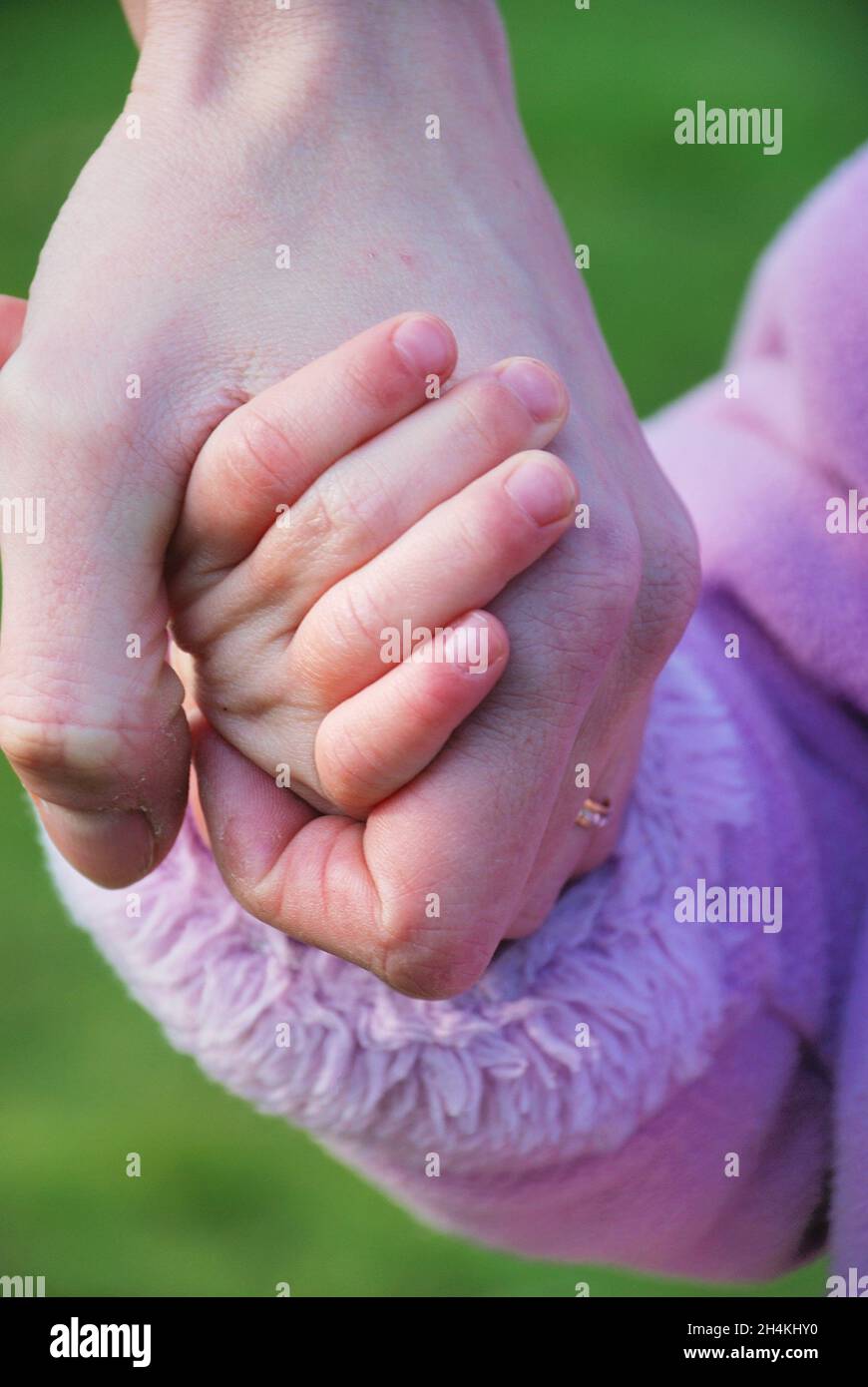 Hand together love family sign Stock Photo - Alamy