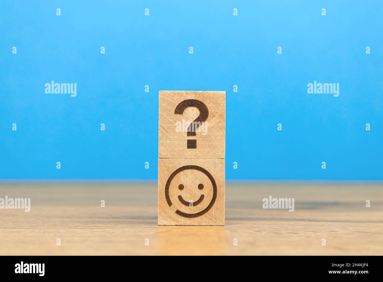 Customer with question mark. Support concept. Wooden cube with icons ...