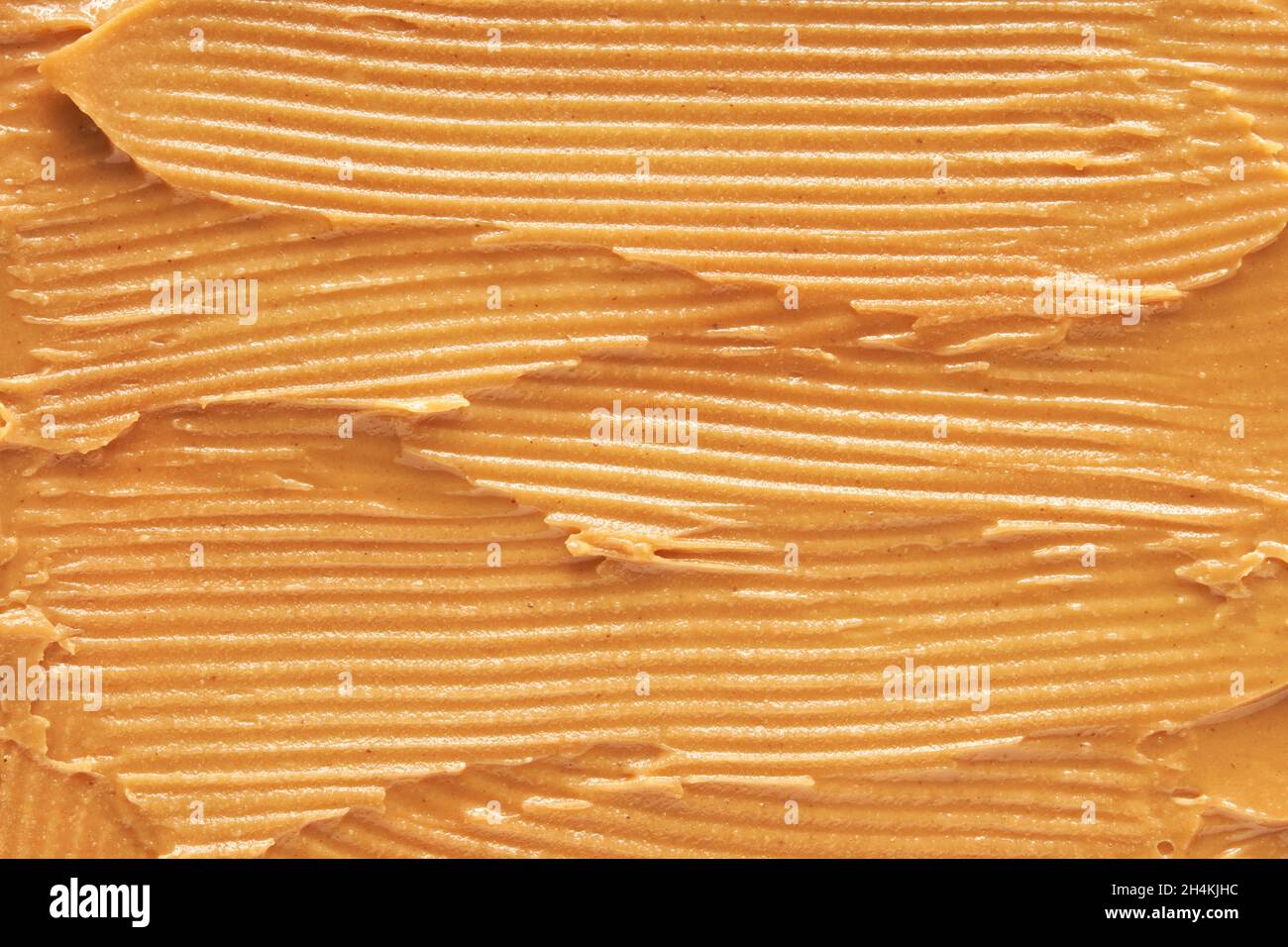 Peanut butter texture. Spread swirl. Organic keto food Stock Photo - Alamy