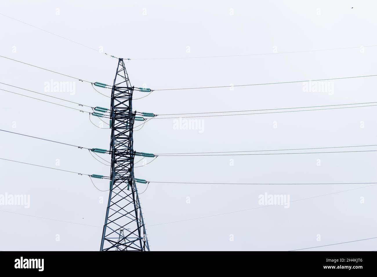 Power lines on the background of the cloudy sky Stock Photo - Alamy
