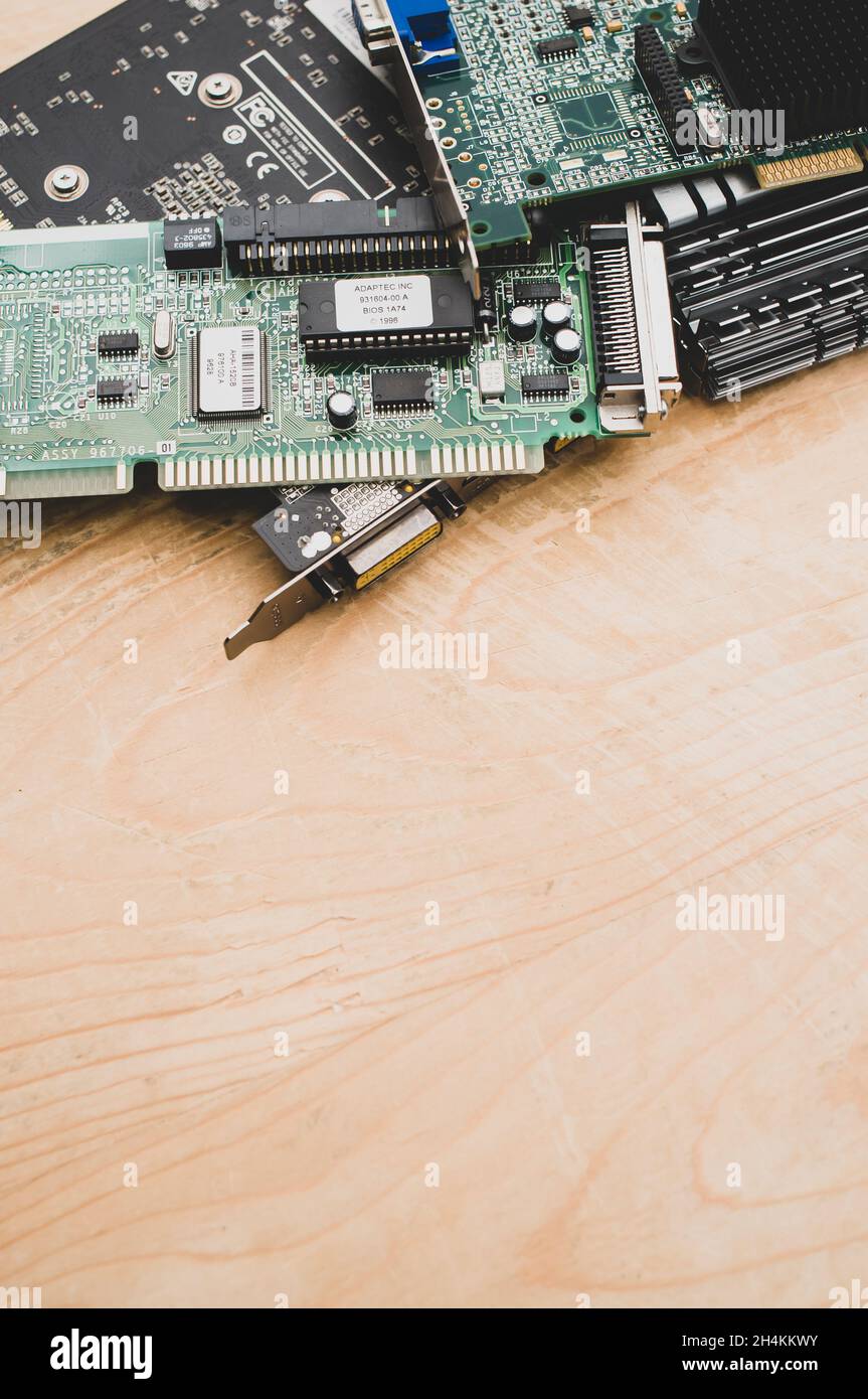 electronic devices integrated circuit boards and cables piled up on a ...