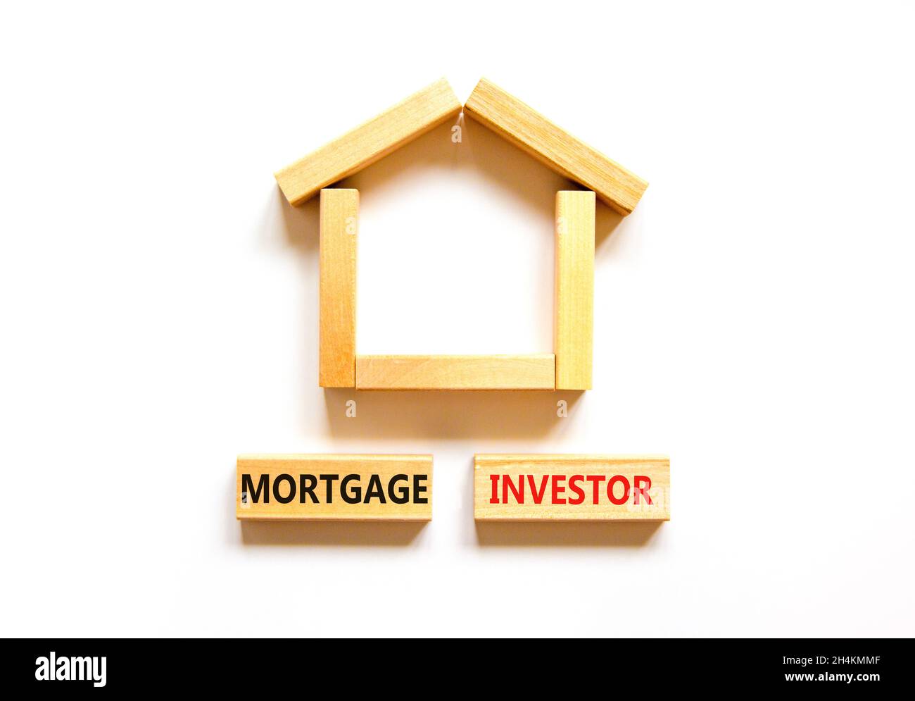 Word investor on wooden Cut Out Stock Images & Pictures - Alamy