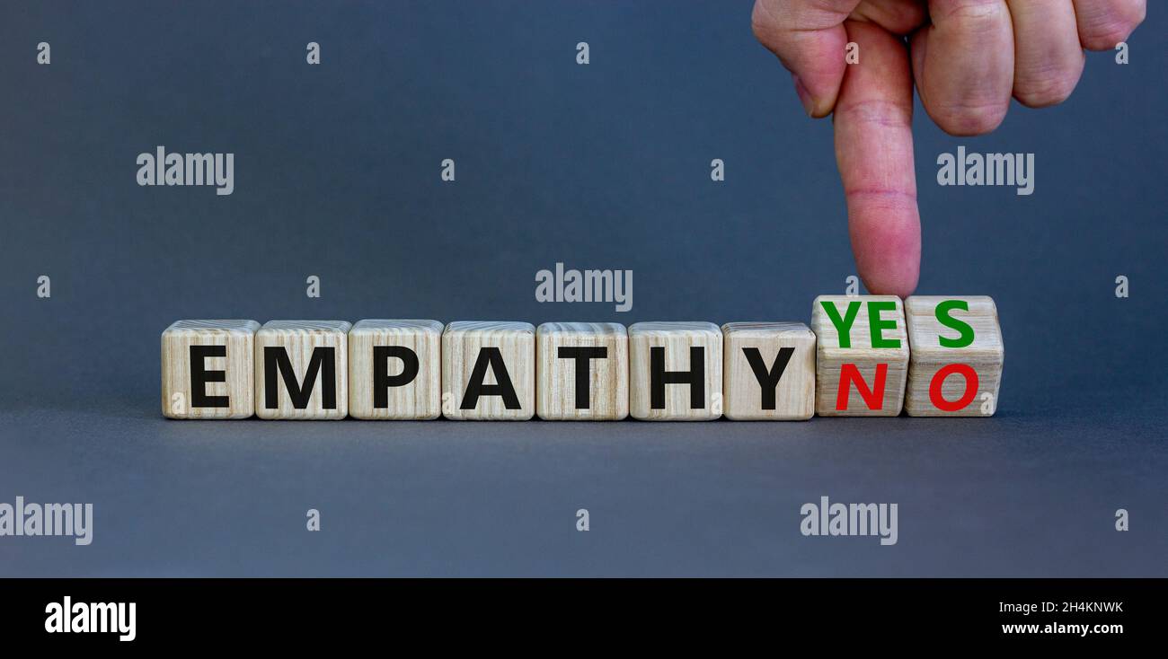 Empathy yes or no symbol. Psychologist turns wooden cubes and changes ...
