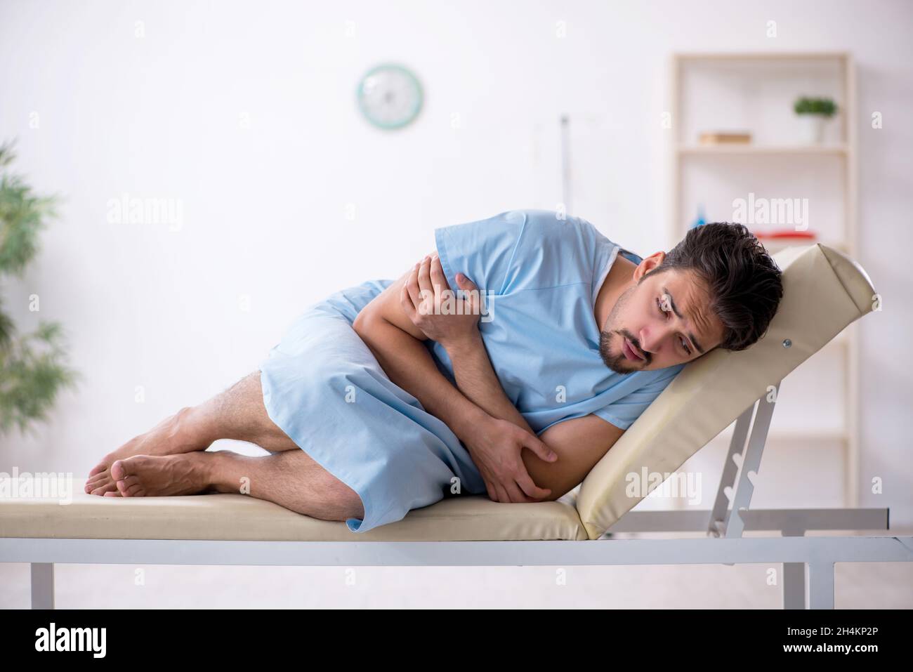 Young patient waiting for doctor in the clinic Stock Photo - Alamy