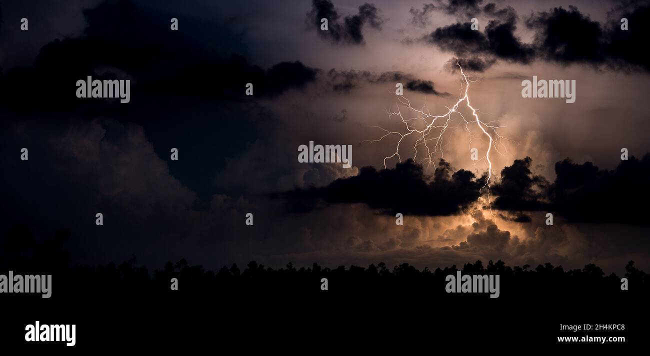 Flash of lightning in a dark sky Stock Photo - Alamy