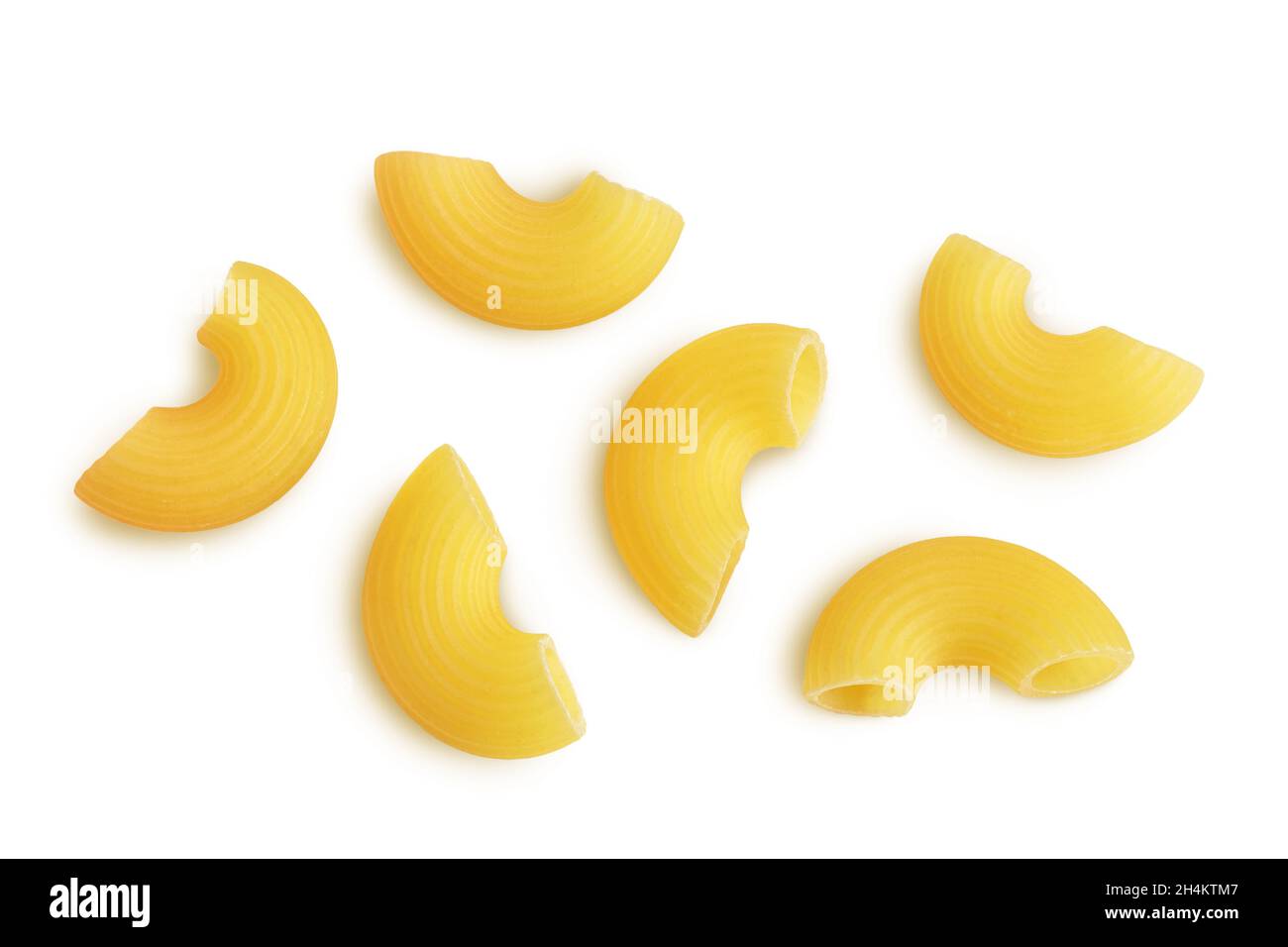 raw macaroni pasta isolated on white background with clipping path and ...