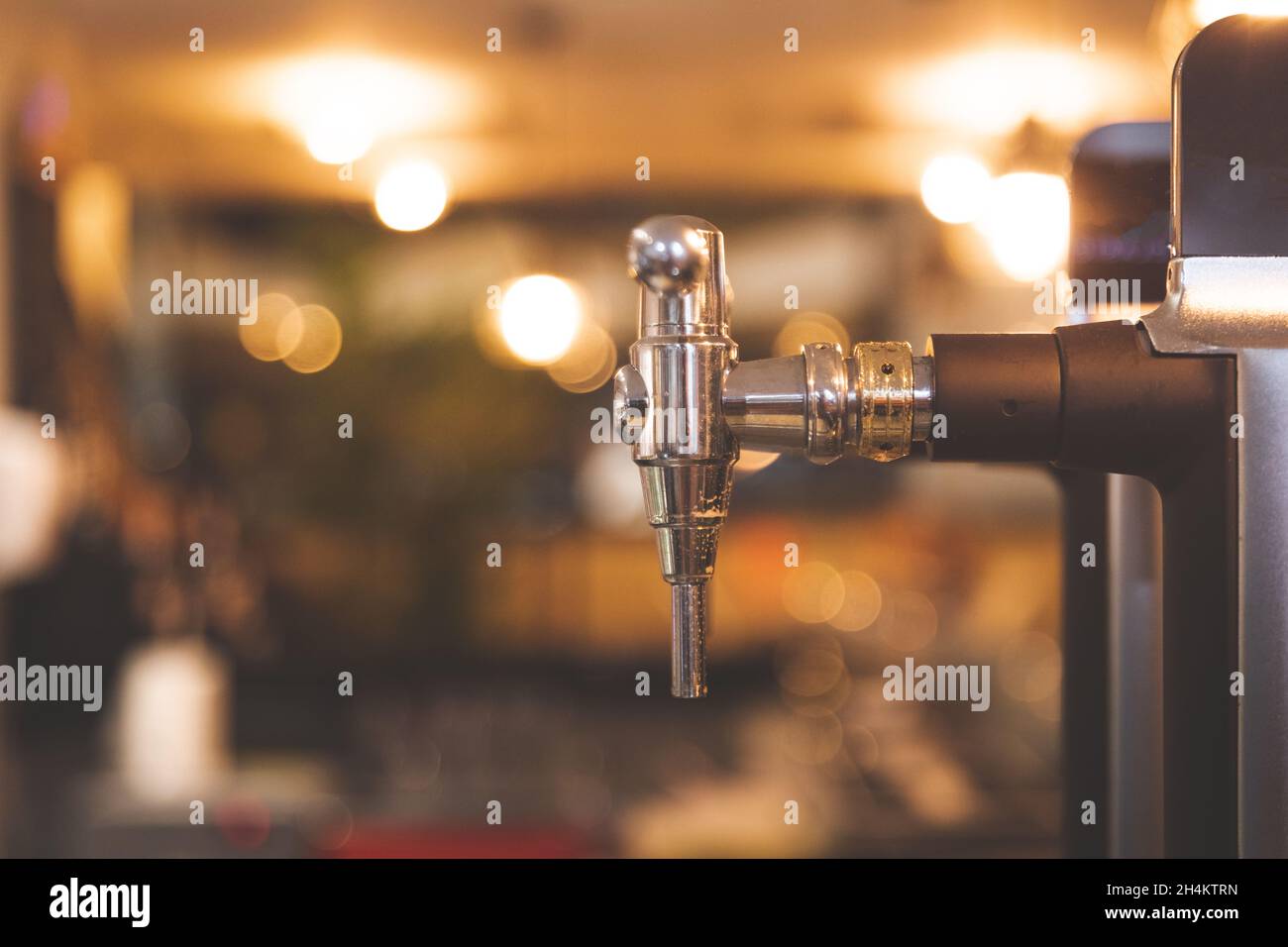 Beer shooter with unfocused background of a bar Stock Photo - Alamy