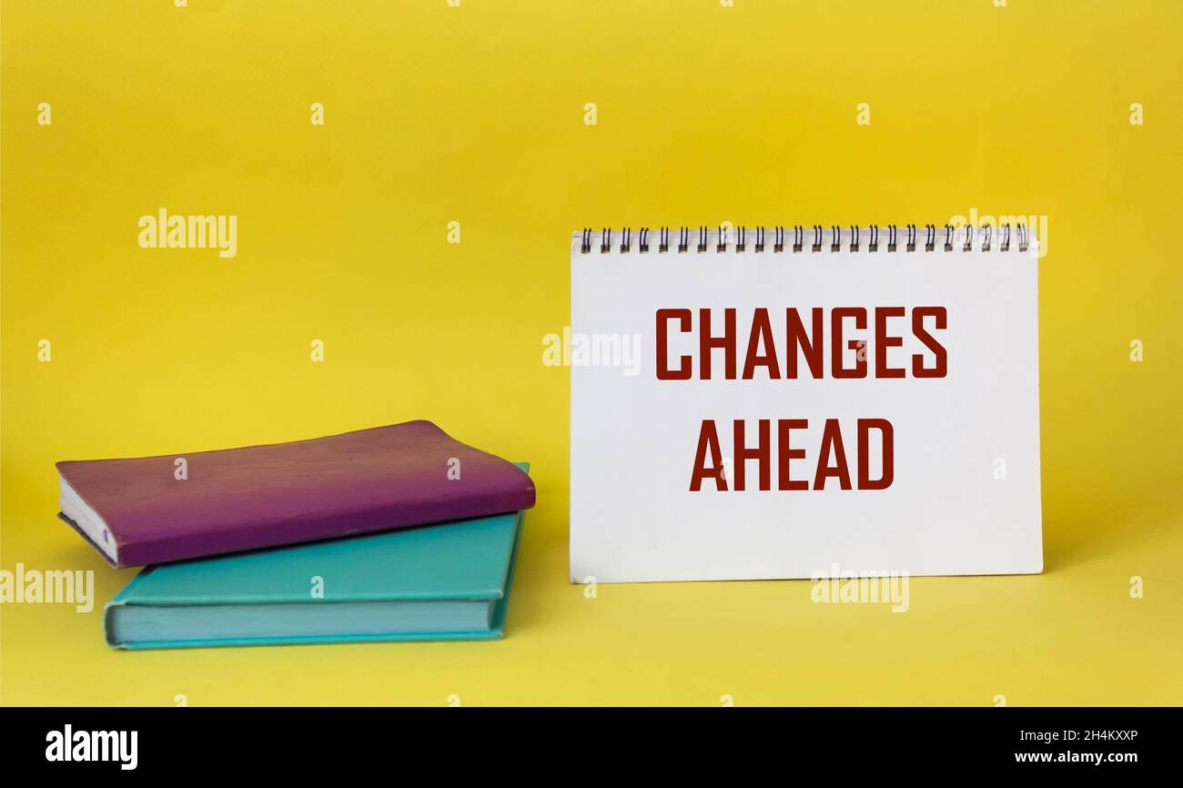 Paper note with text Change Ahead, business concept Stock Photo - Alamy