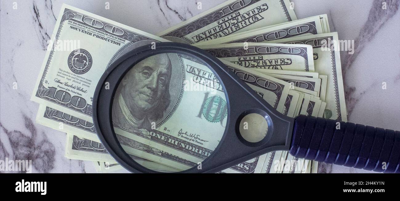Money under the magnifying glass hi-res stock photography and images ...