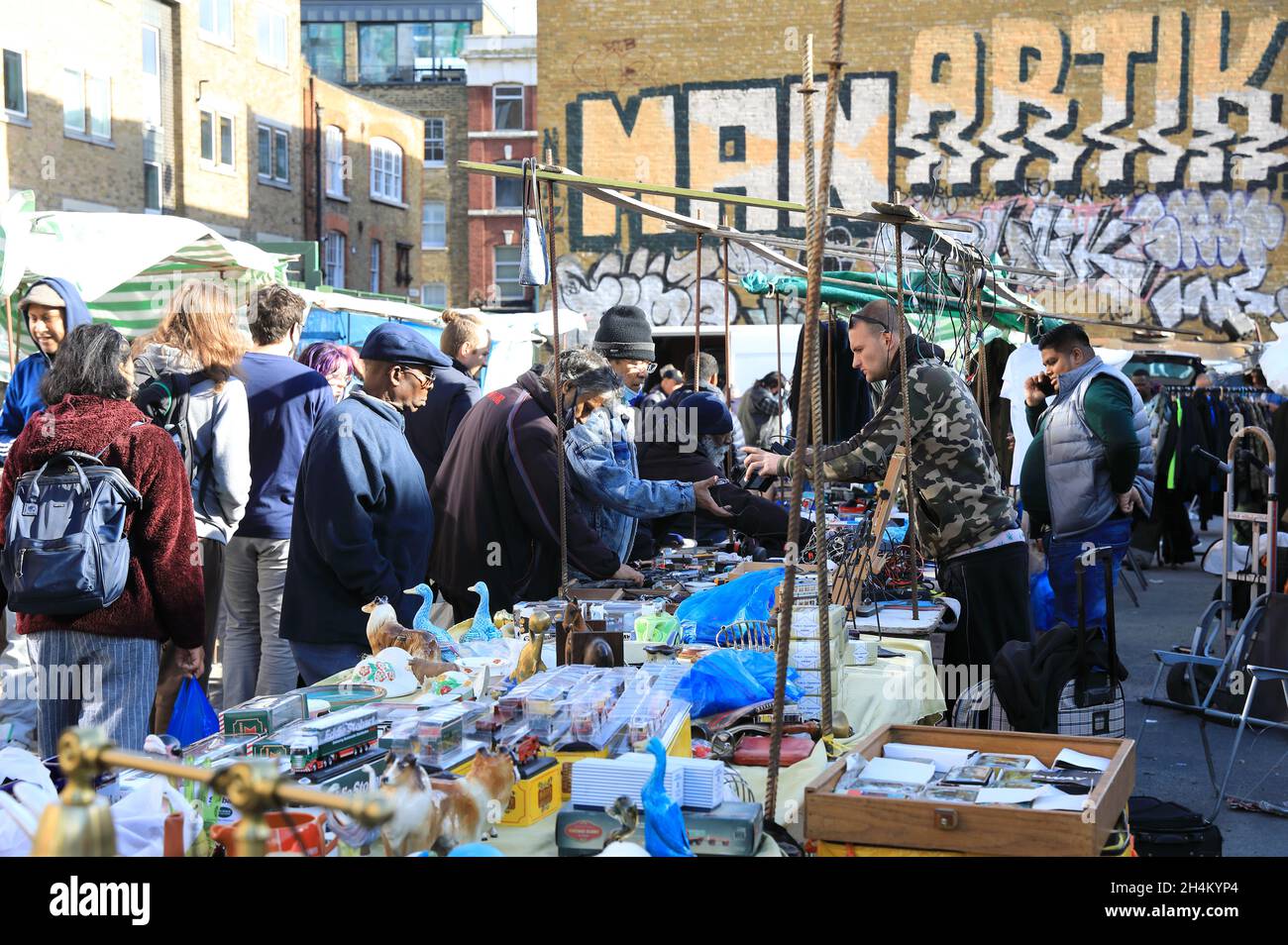 The lively vintage flea market at Brick Lane, in autumn sunshine, east ...
