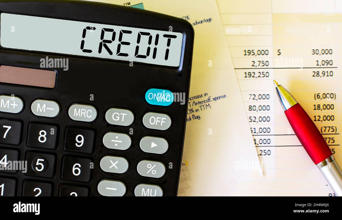 CREDIT text on calculator display, consumables, analytical chart on a ...