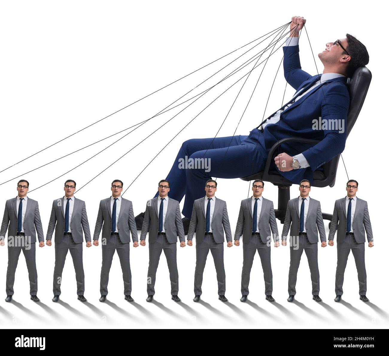 The boss employee manipulating his staff in business concept Stock ...