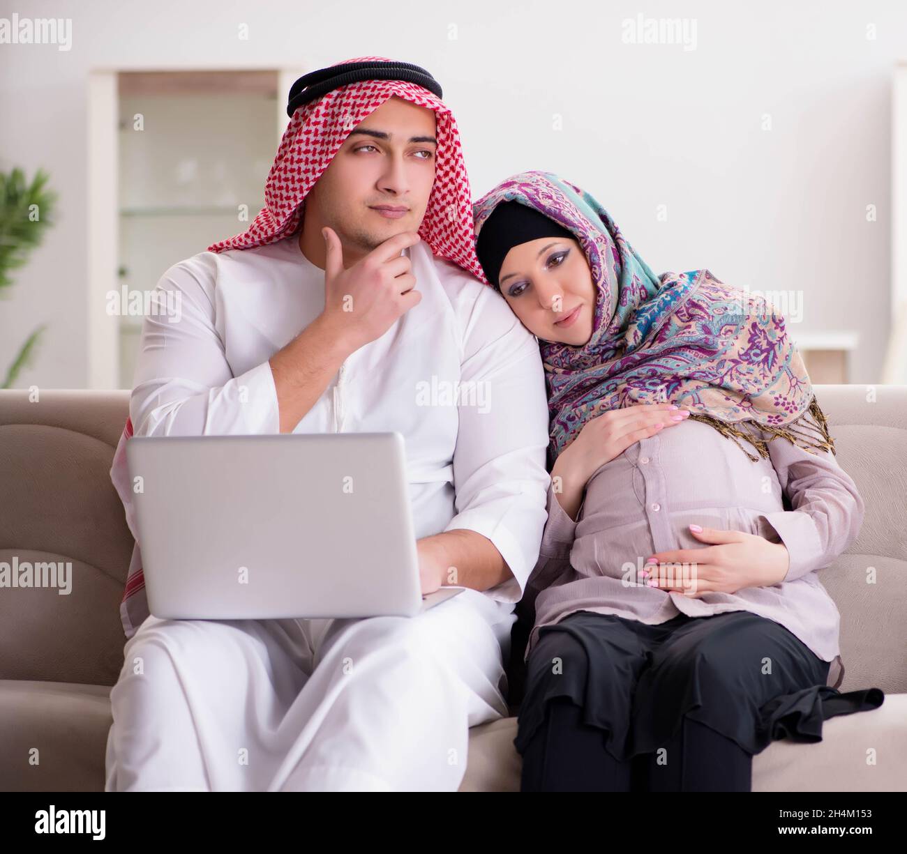 Young arab muslim family pregnant hi-res stock photography and images ...