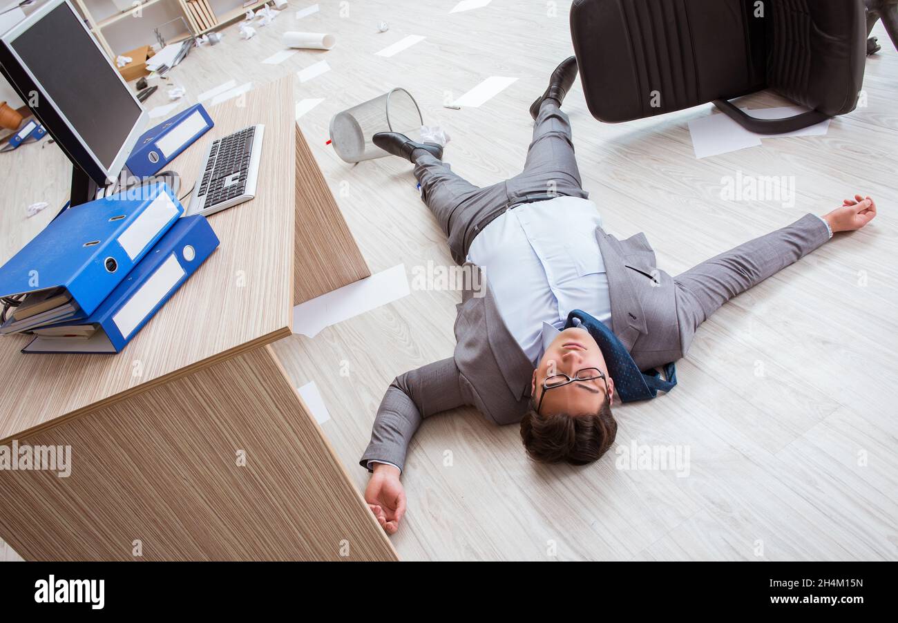 The businessman dead on the office floor Stock Photo - Alamy